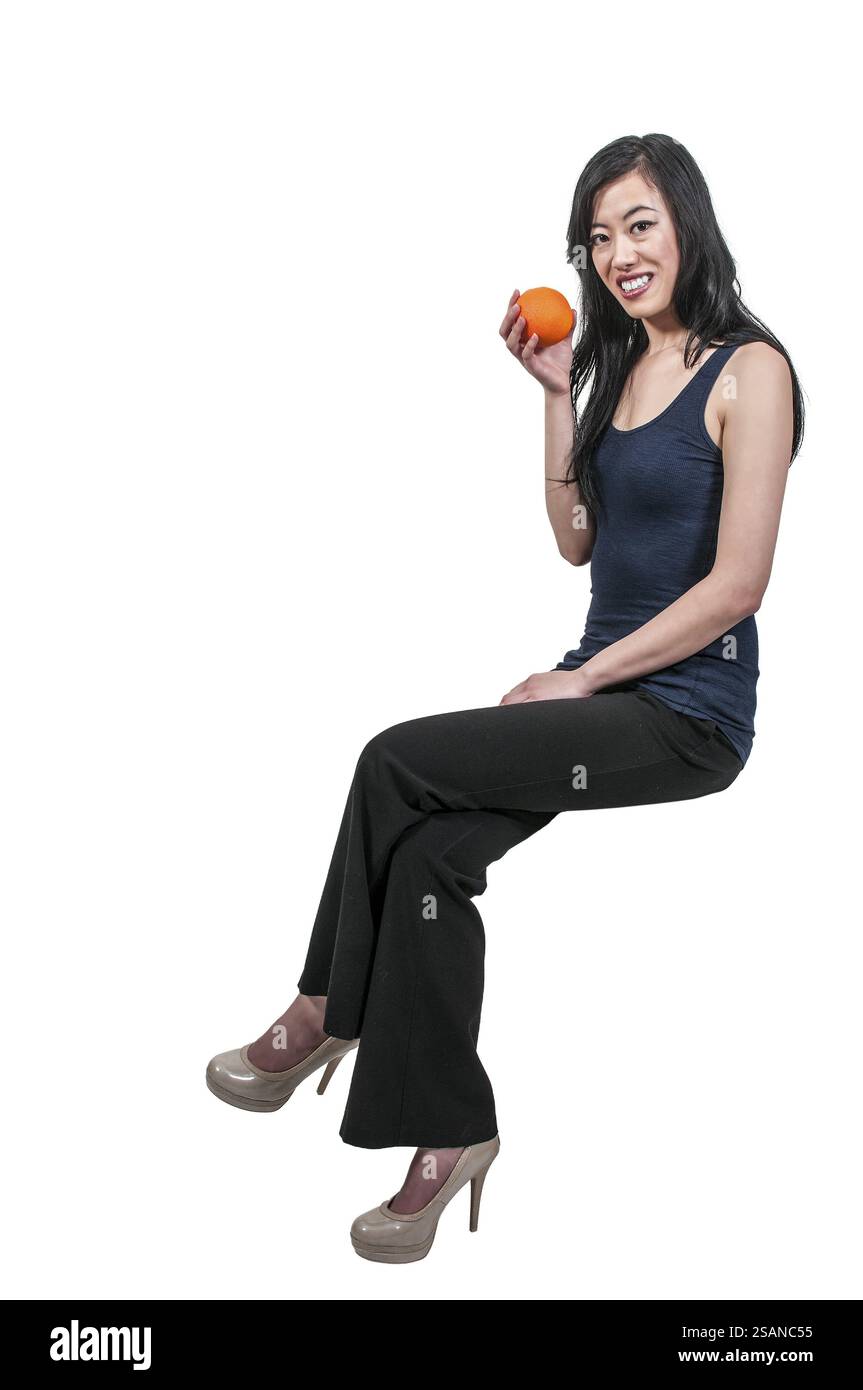 Seated young women Cut Out Stock Images & Pictures - Alamy