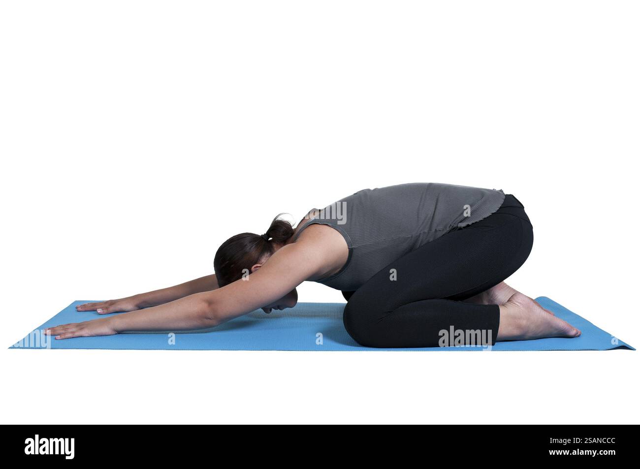 Woman practicing yoga exercise on Cut Out Stock Images & Pictures - Alamy