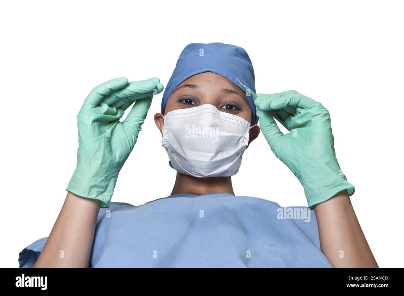 A beautiful young woman surgeon performing surgery Stock Photo - Alamy