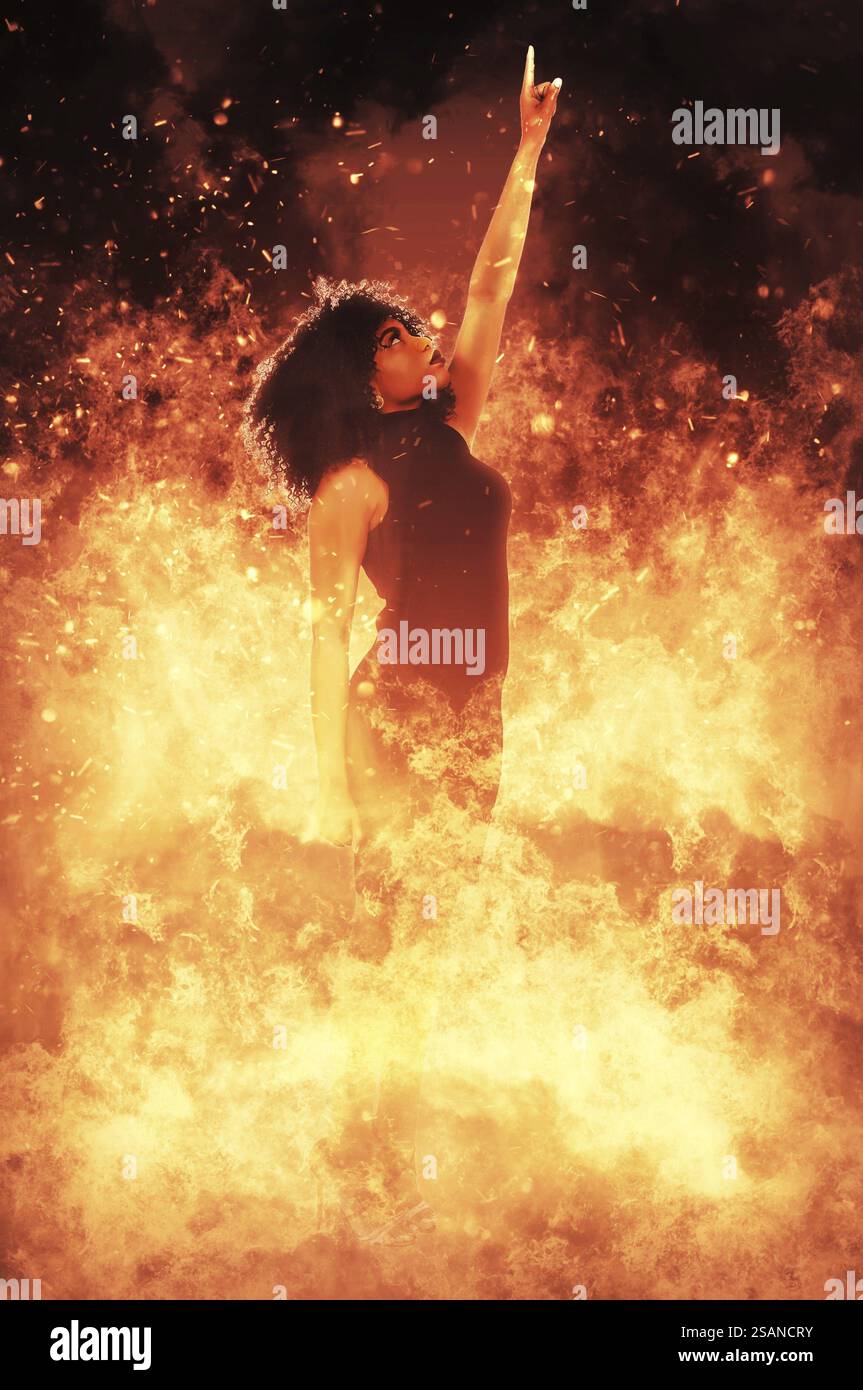 Beautiful woman standing in the midst of a fire Stock Photo - Alamy