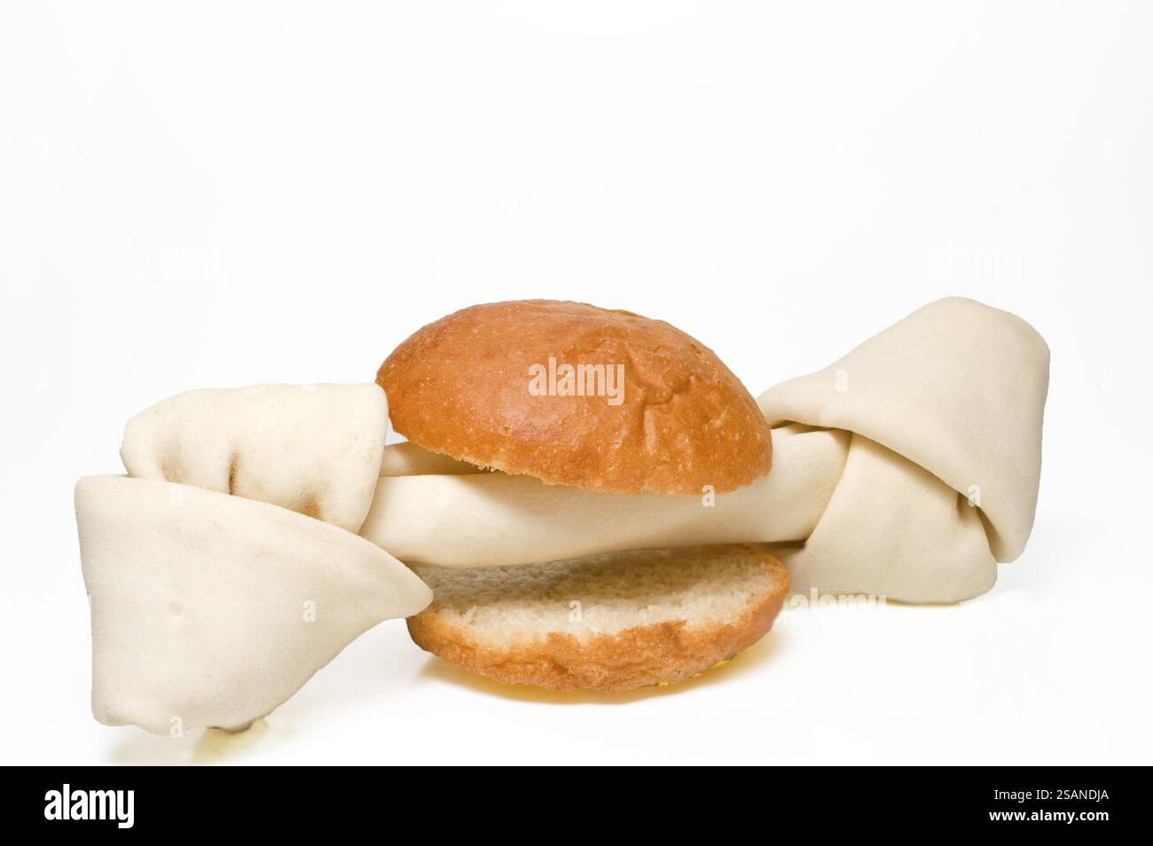 A sandwich made with a rawhide dog bone Stock Photo - Alamy