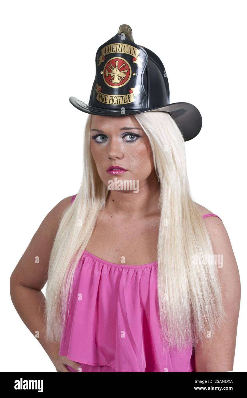 A beautiful woman firefighter at a fire Stock Photo - Alamy