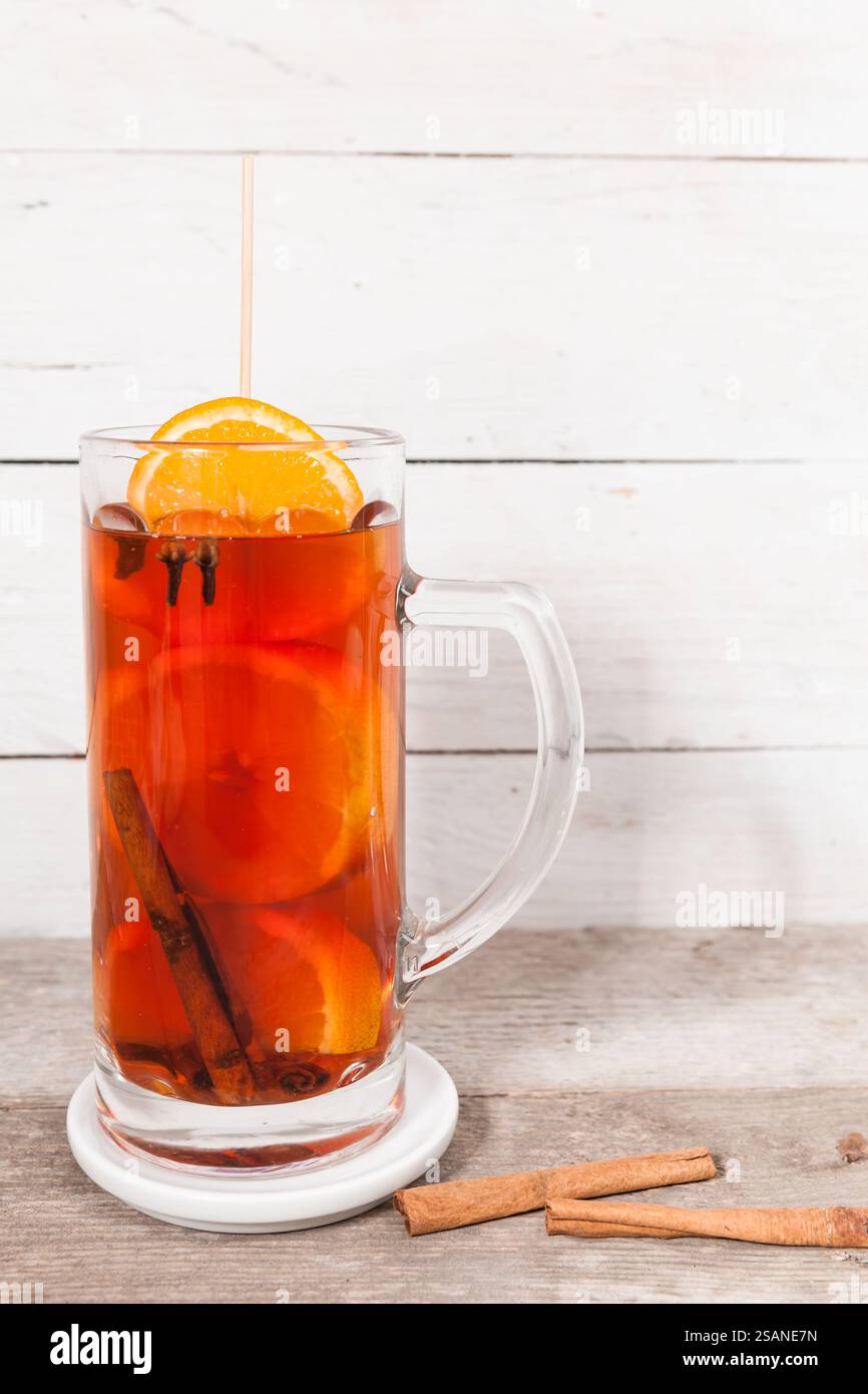 Winter hot tea with cloves, cinnamon, ginger, oranges and raspberry ...