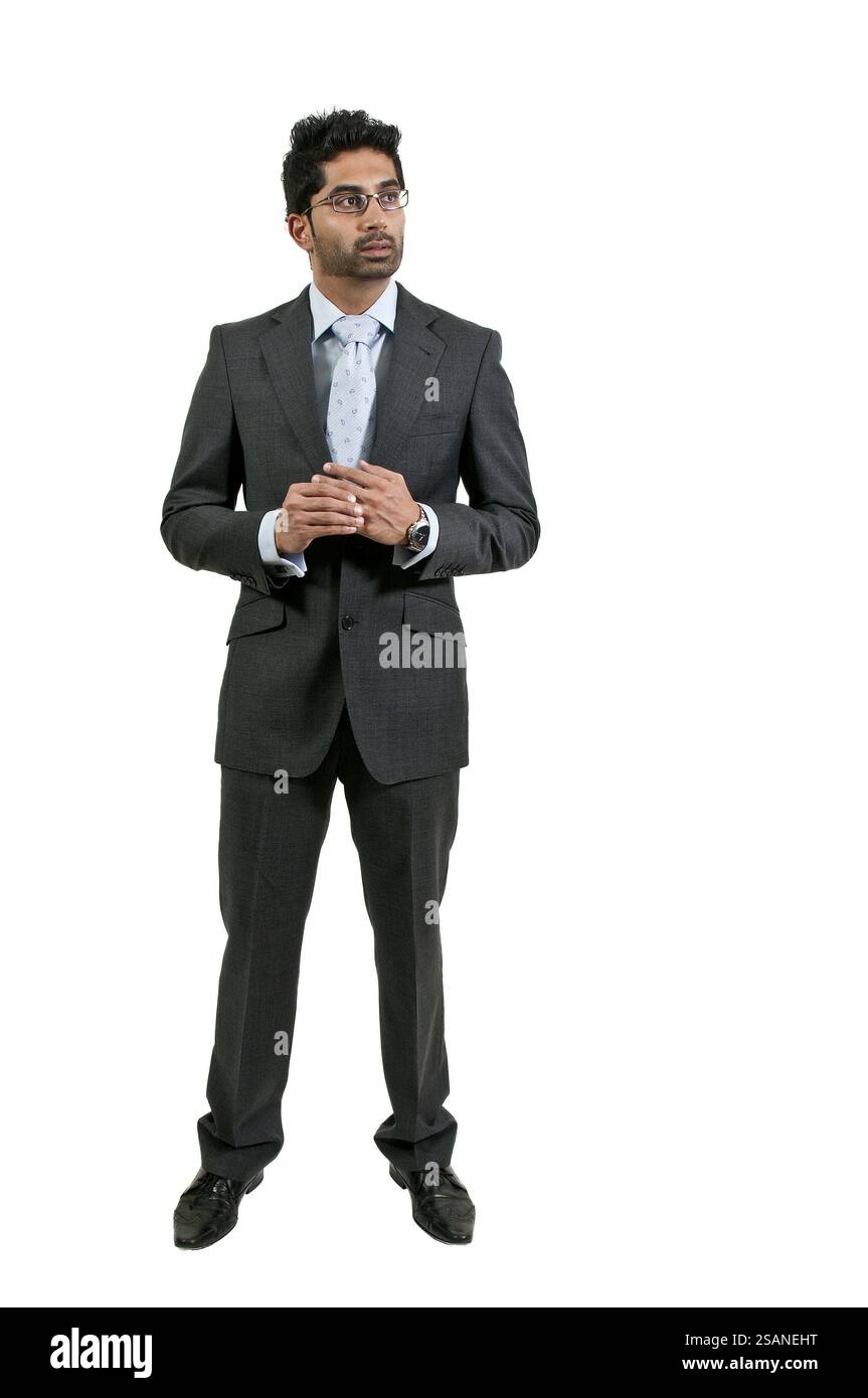 Young handsome businessman looking for work Stock Photo - Alamy