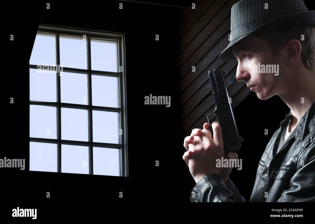Police detective man on the job with a gun Stock Photo - Alamy