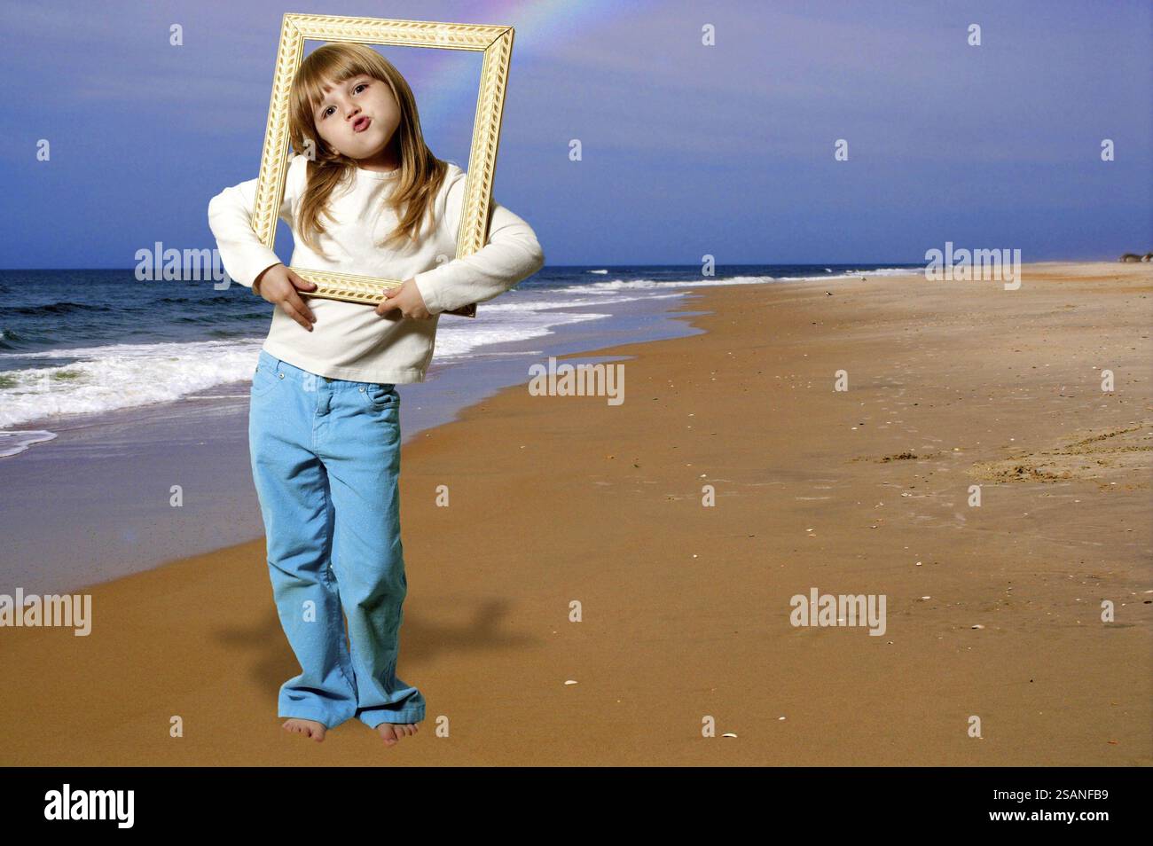 Beautiful little girl looking through an ornate picture frame Stock ...