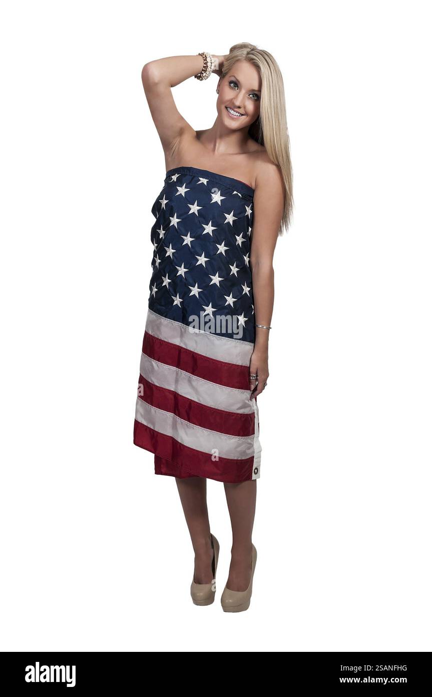Beautiful young woman wrapped in a flag Stock Photo - Alamy