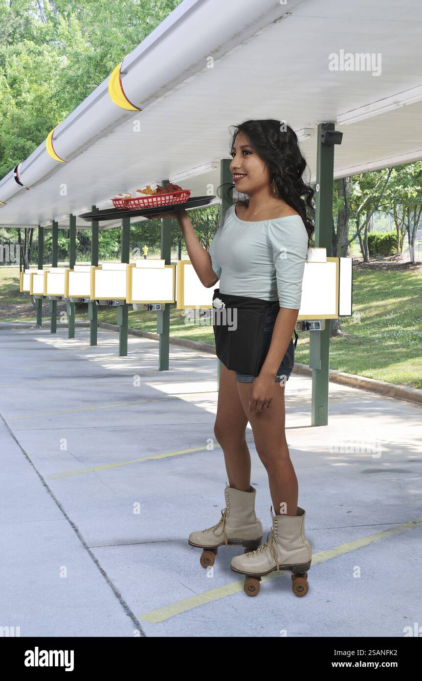 Woman food service worker server or waitress on roller skates Stock ...
