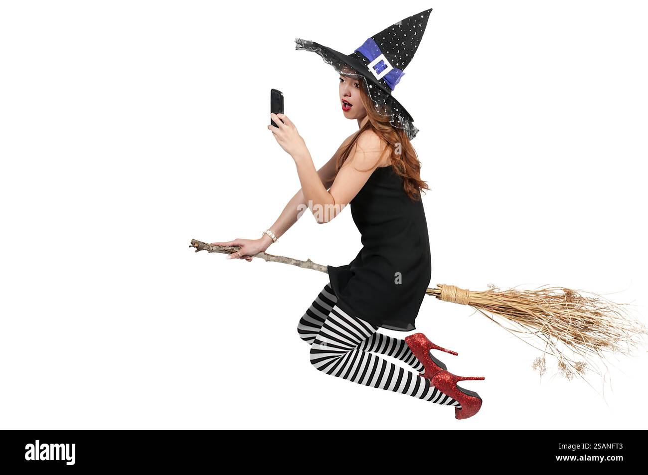 Beautiful woman wicked witch with ruby shoes Stock Photo - Alamy