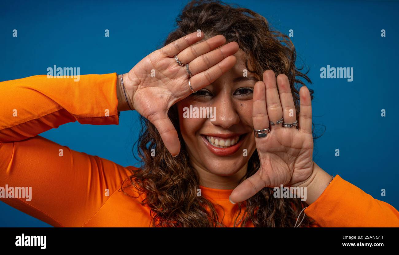Woman framing gesture wearing hi-res stock photography and images - Alamy