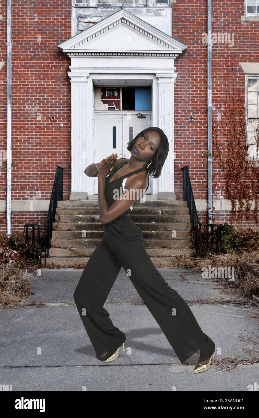 Beautiful young black woman dancing the night away Stock Photo - Alamy