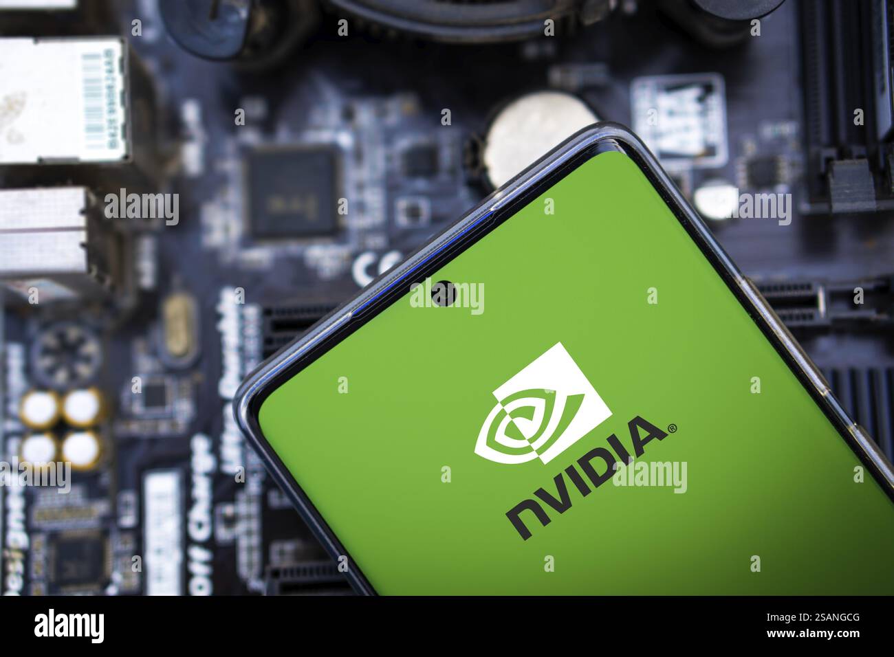NVIDIA logo on phone and blurred chip on the background-Dhaka ...