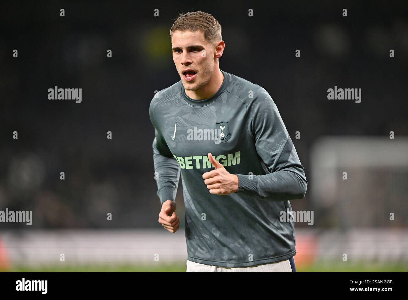 London, UK. 30th Jan, 2025. Micky van de Ven of Tottenham Hotspur warms ...