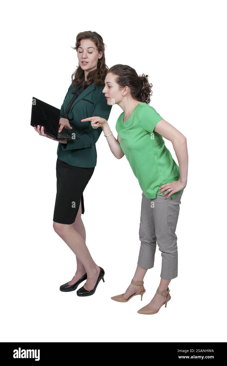 Beautiful computer savvy young woman using a laptop Stock Photo - Alamy