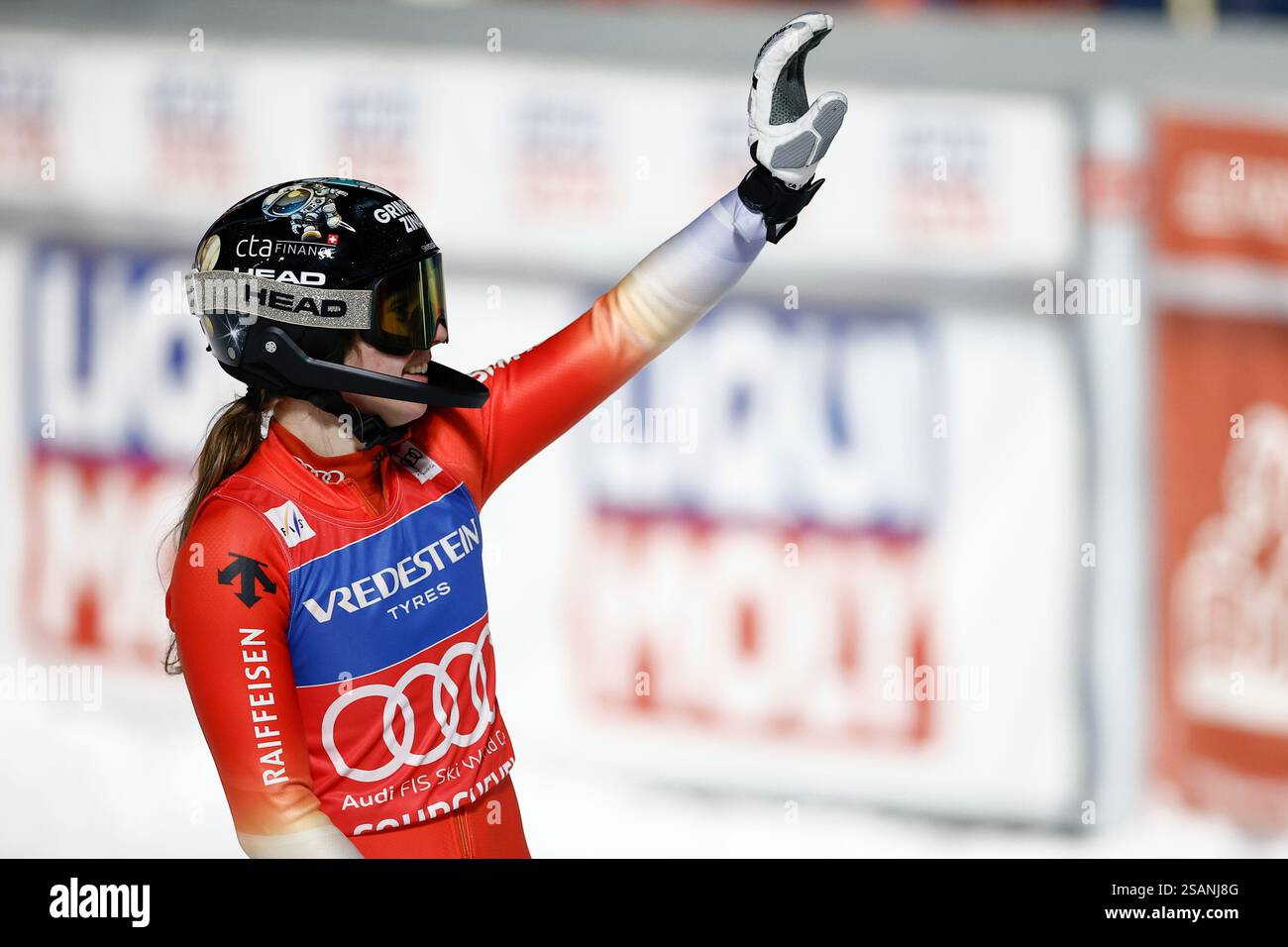 Switzerland's Camille Rast waves as she gets to the finish area after ...