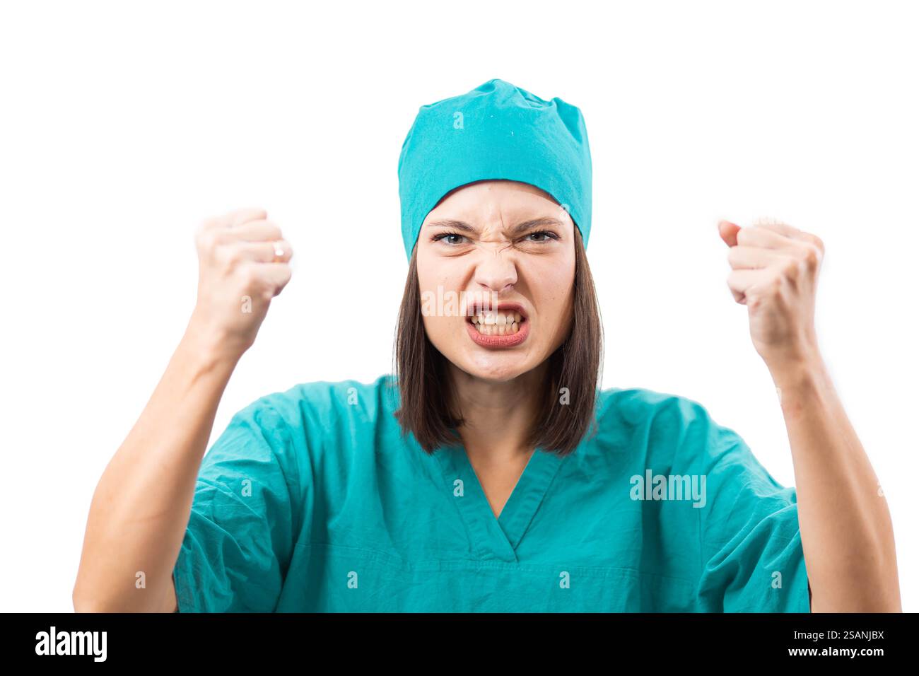 Nurse exhibiting anger with fists raised in teal uniform against a ...
