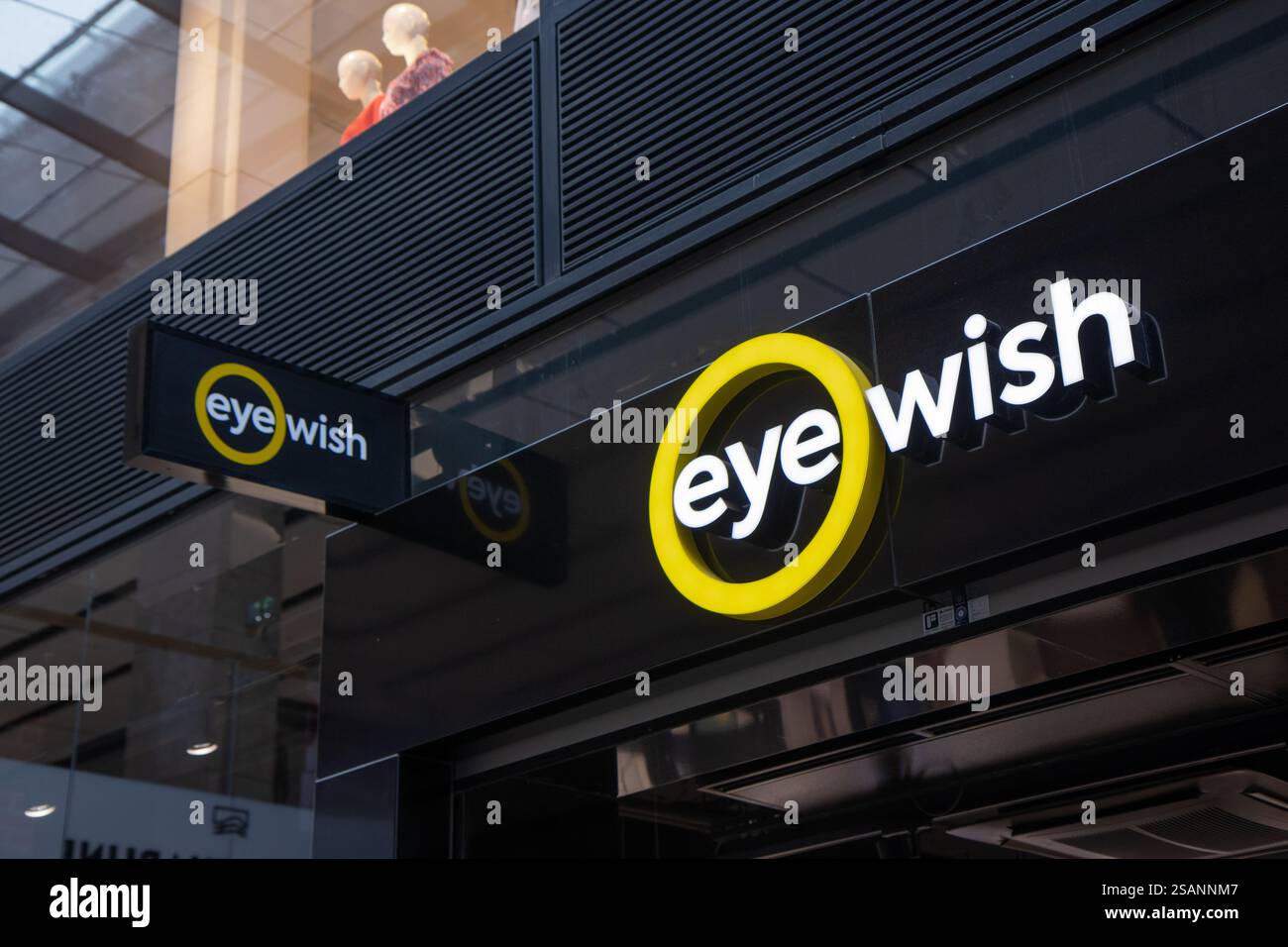 Eye Wish Opticien store, with illuminated shop logo. Utrecht in the ...