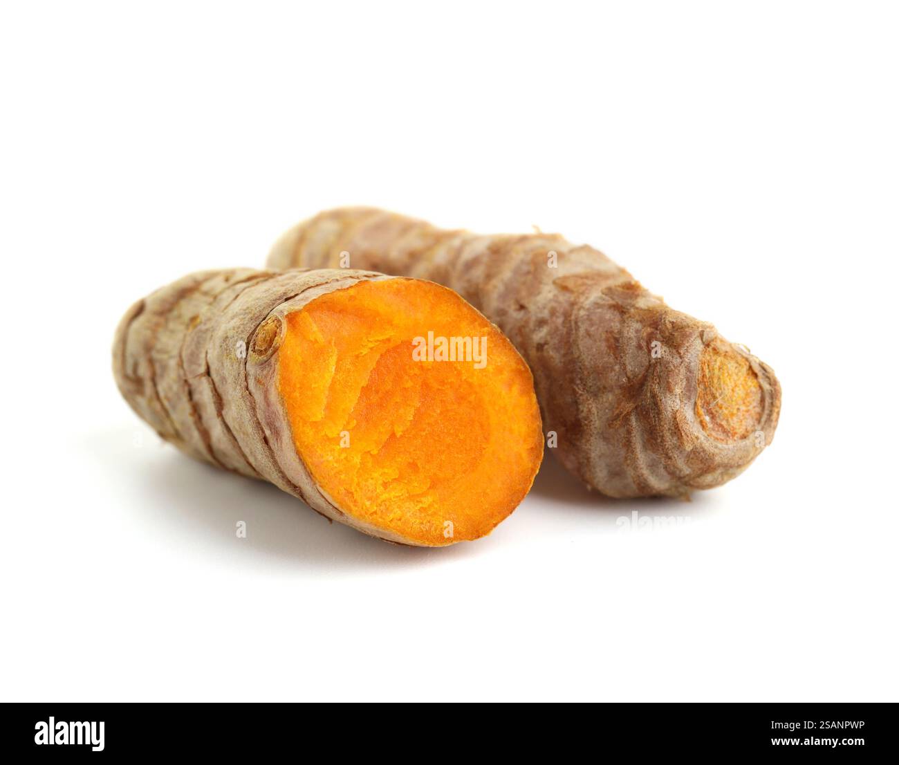 Whole and cut turmeric roots isolated on white Stock Photo - Alamy