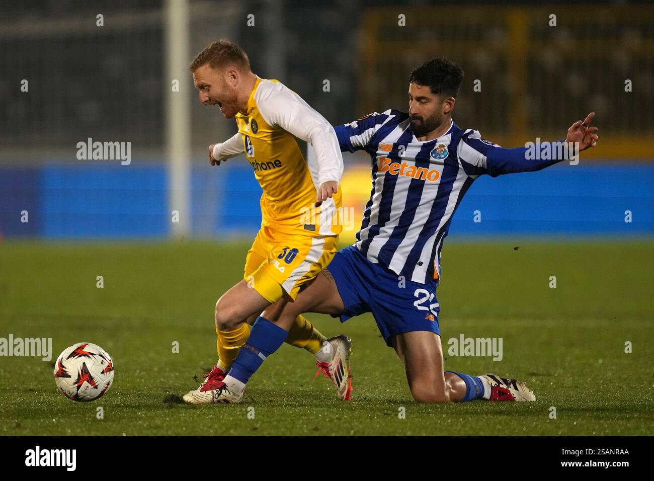 Porto's Alan Varelaand Maccabi Tel Aviv's Ido Shahar, from right ...