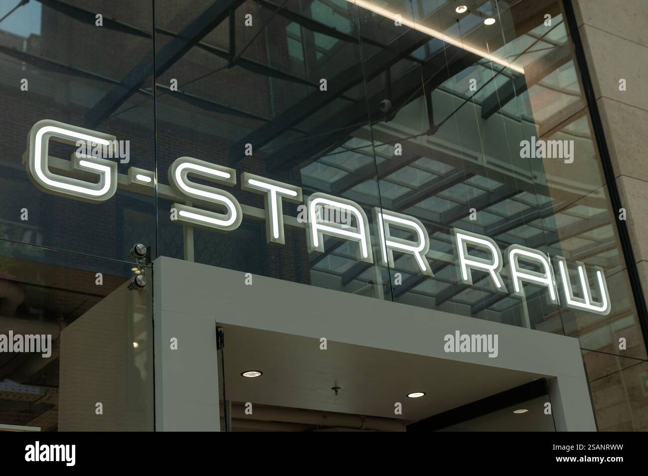 . G-Star Raw shop, illuminated neon look store logo. G-Star RAW ...