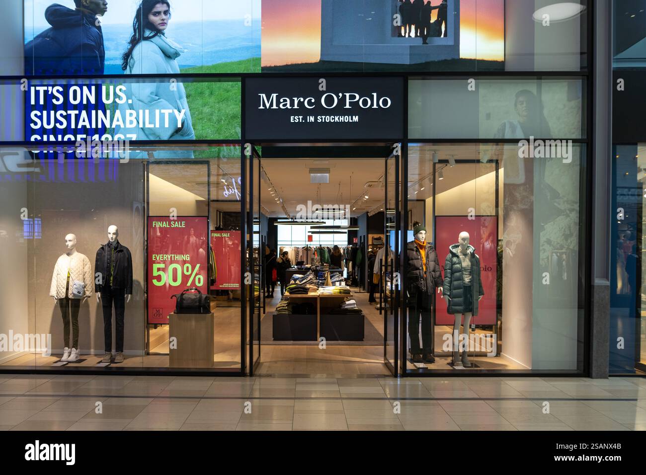 Marc O'Polo fashion shop, illuminated store logo. Marc O’Polo is a ...