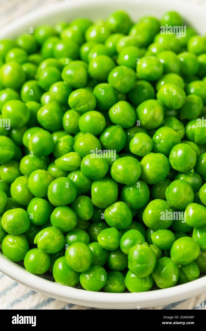 Organic Steamed Frozen Green Peas in a Bowl Stock Photo - Alamy