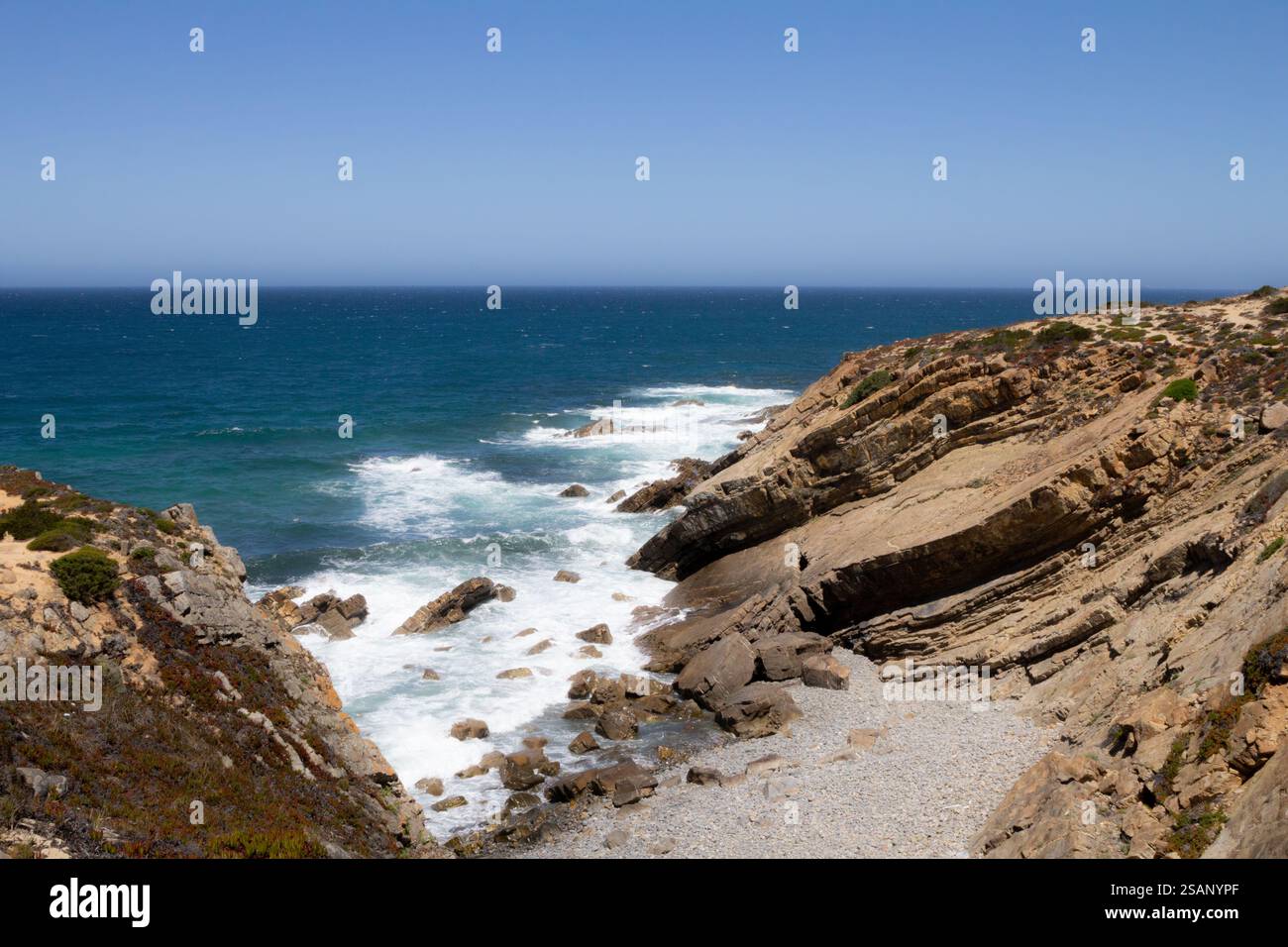 The ocean waves along the Rota Vicentina trail are perfect for surfing ...