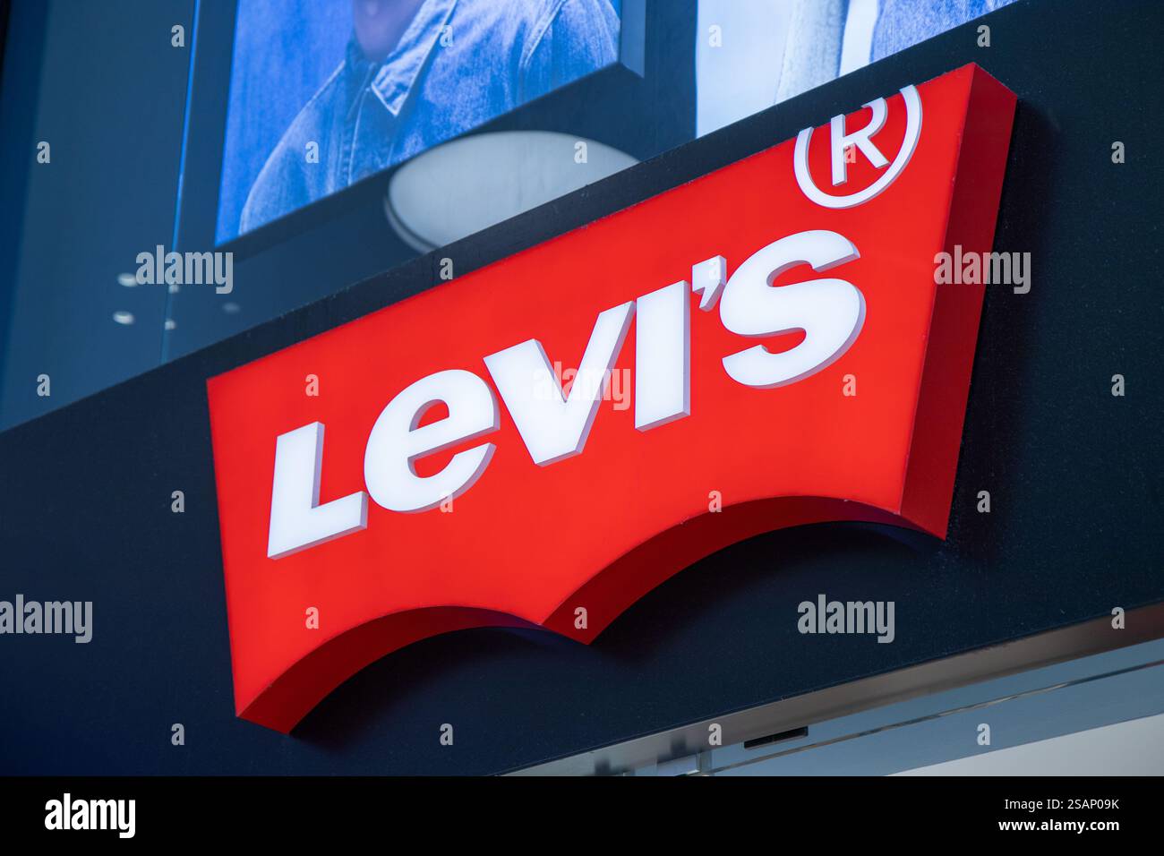 Levi’s logo sign above the shop entrance. Levi Strauss and Co is an ...