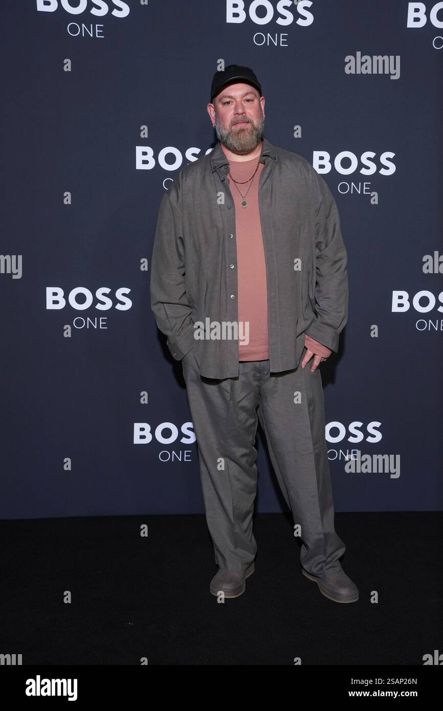 Marco Falcioni poses for photographers upon arrival at the BOSS One x ...
