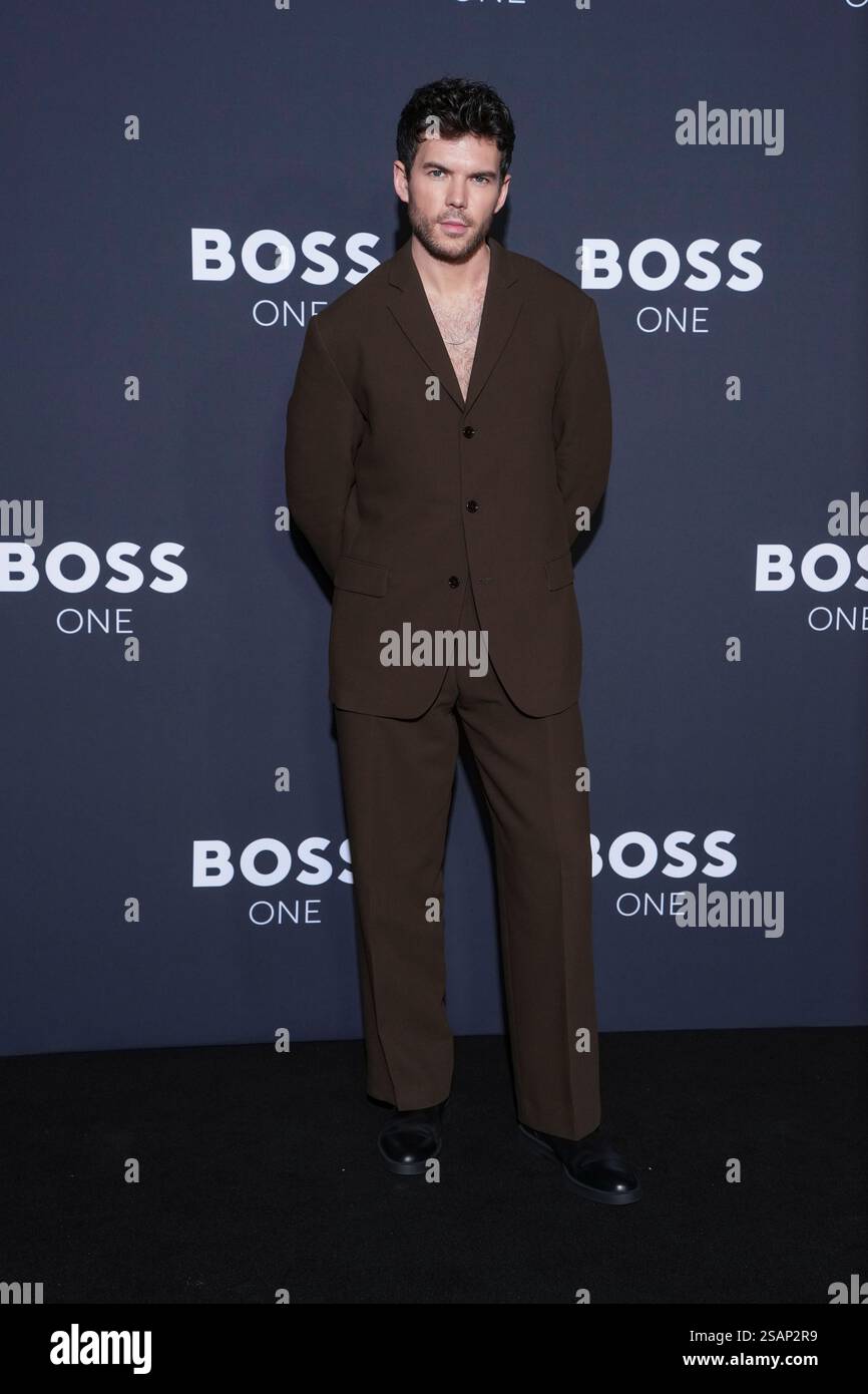 Luke Newton poses for photographers upon arrival at the BOSS One x ...