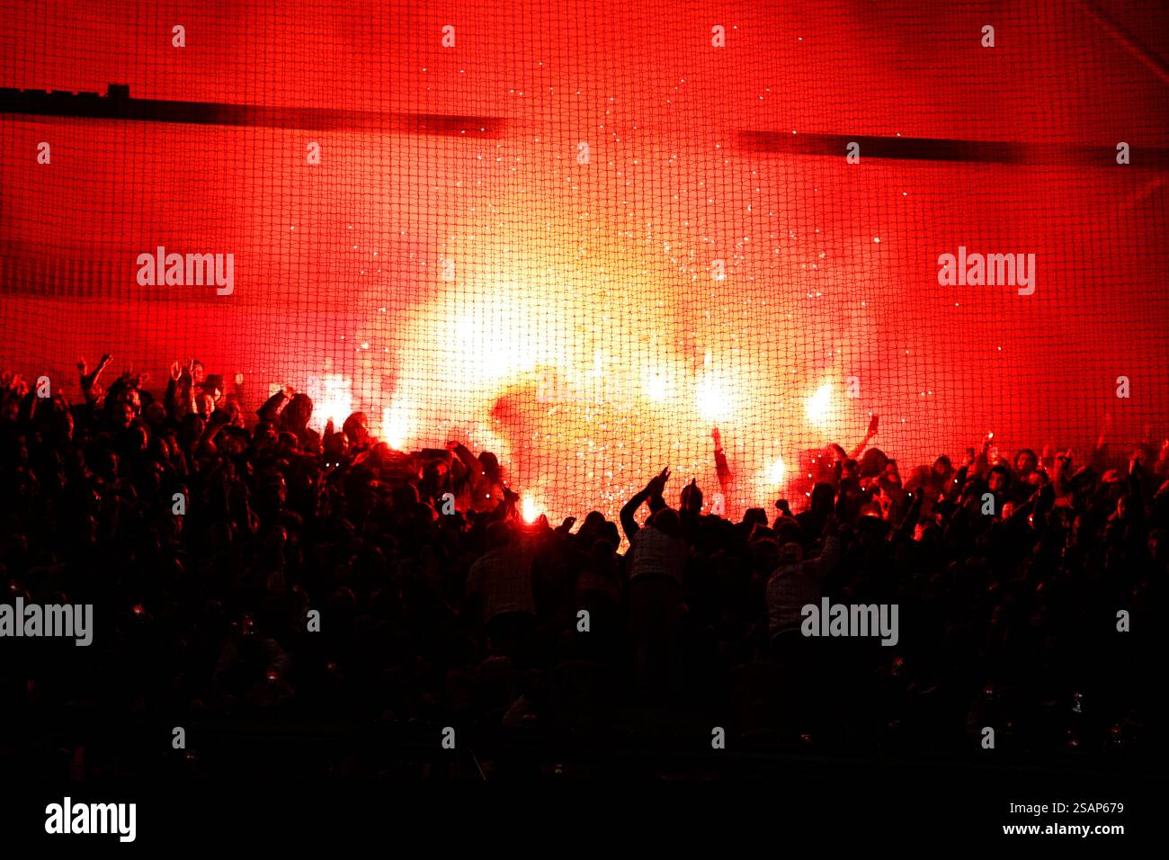 Galatasaray fans hold smoke flares ahead of the Europa League soccer ...