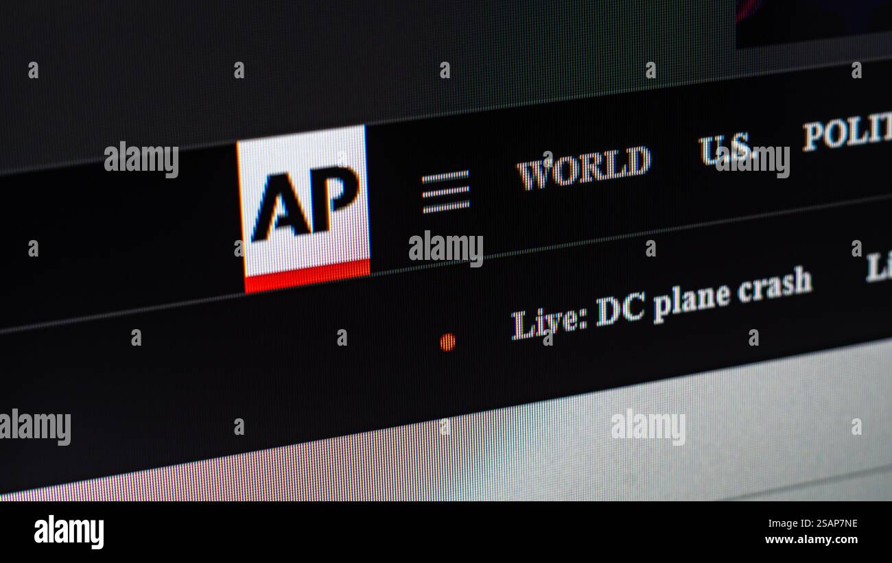 A close-up view of a news website highlights breaking news on a plane ...