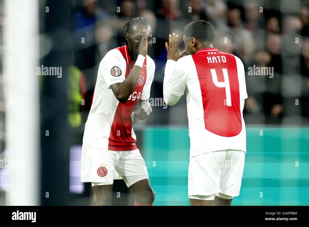 AMSTERDAM - (l-r) Bertrand Traore of Ajax, Jorrel Hato of Ajax ... AMSTERDAM - (l-r) Bertrand Traore of Ajax, Jorrel Hato of Ajax ...