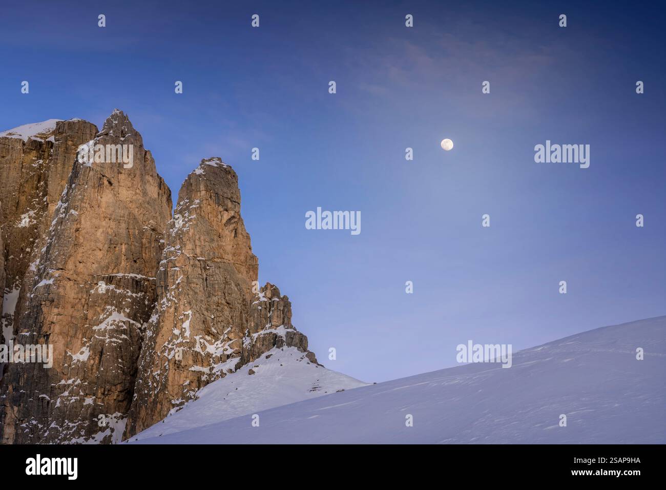 Moonlight sunset on Sella Towers Dolomites Stock Photo - Alamy