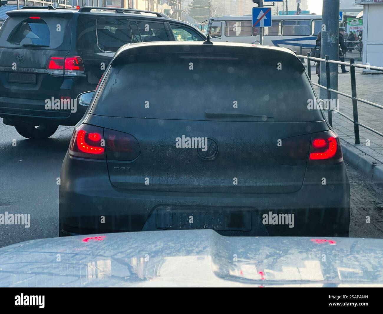 Kyiv, Ukraine - January 30, 2025: Vehicles are stopped on a city road ...
