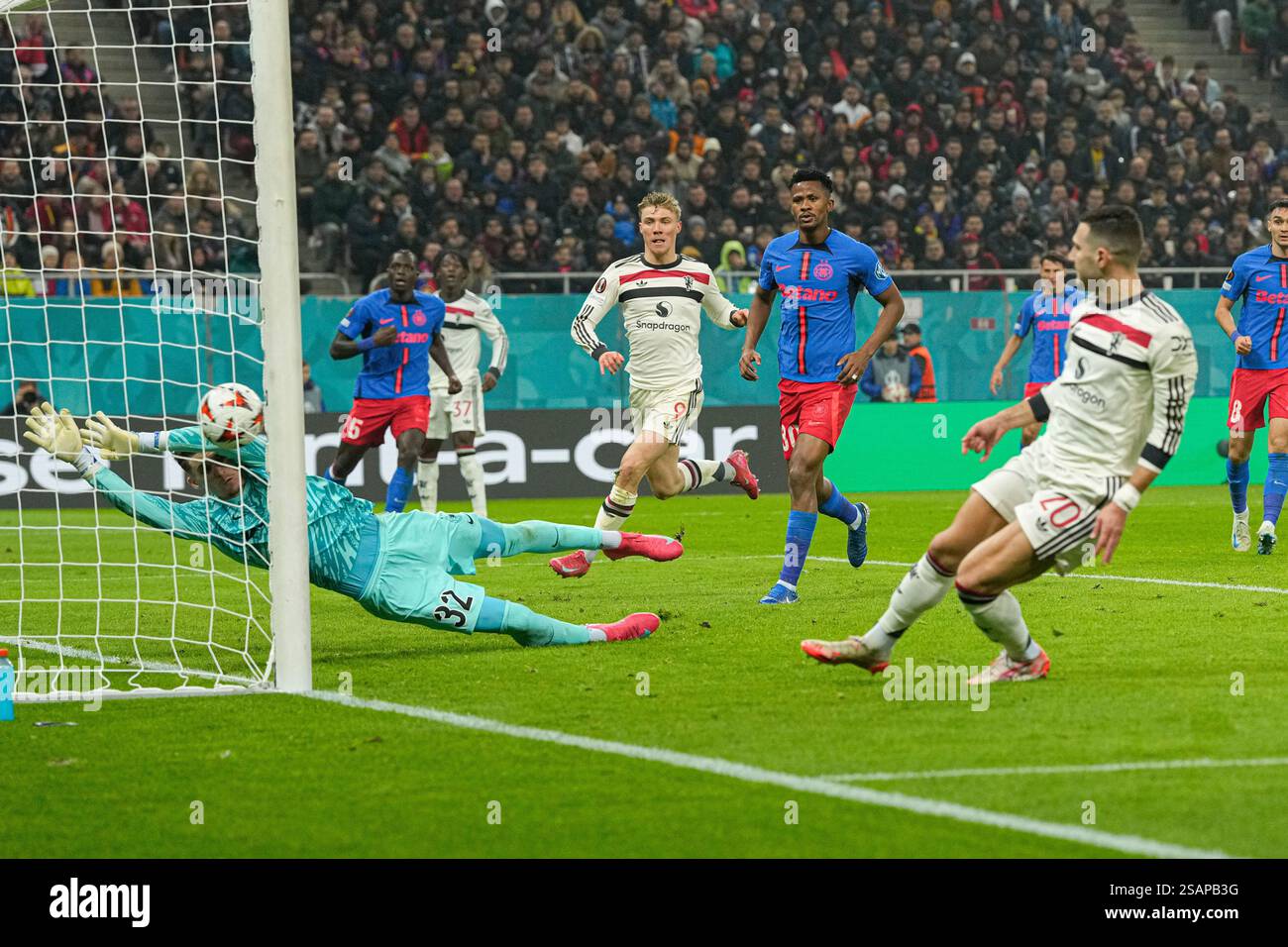 Manchester United's Diogo Dalot scores his side's first goal during the ...