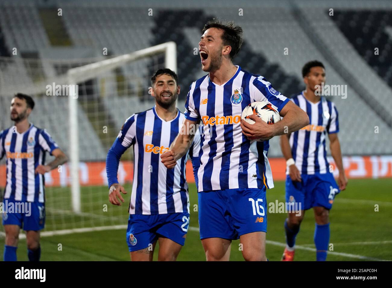 Porto's Nico Gonzalez celebrates after scoring the opening goal during ...