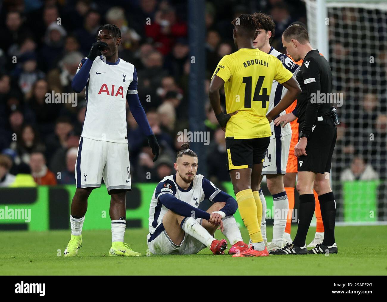 London, UK. 30th Jan, 2025. Radu Drăgușin of Tottenham Hotspur goes off ...