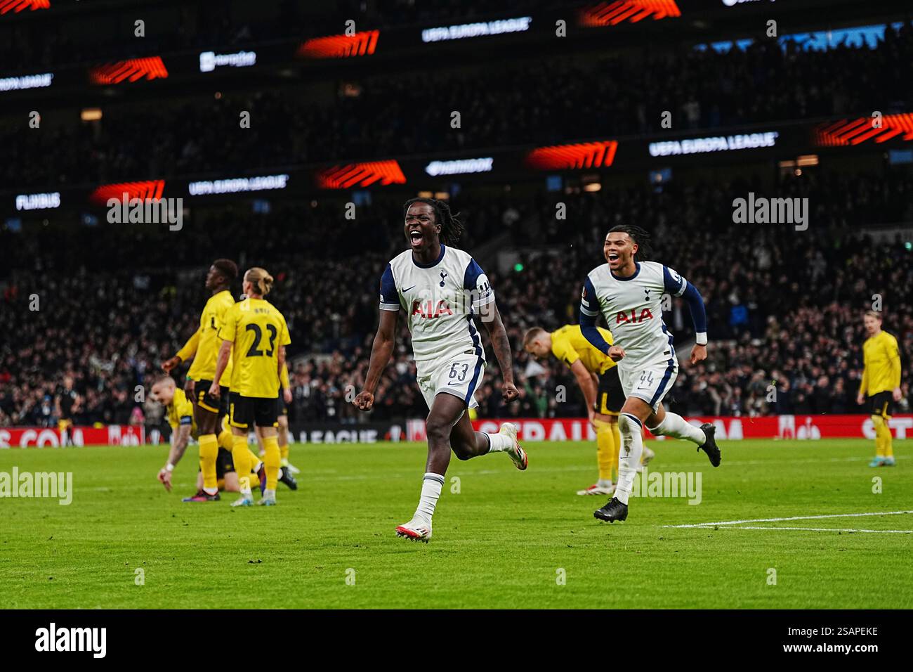 Tottenham's Oyindamola Ajayi, centre, celebrates after scoring his side ...