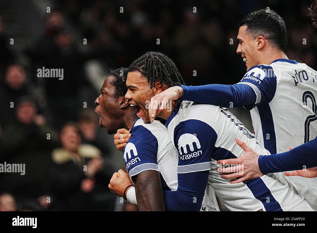 Tottenham's Oyindamola Ajayi, left, celebrates after scoring his side's ...