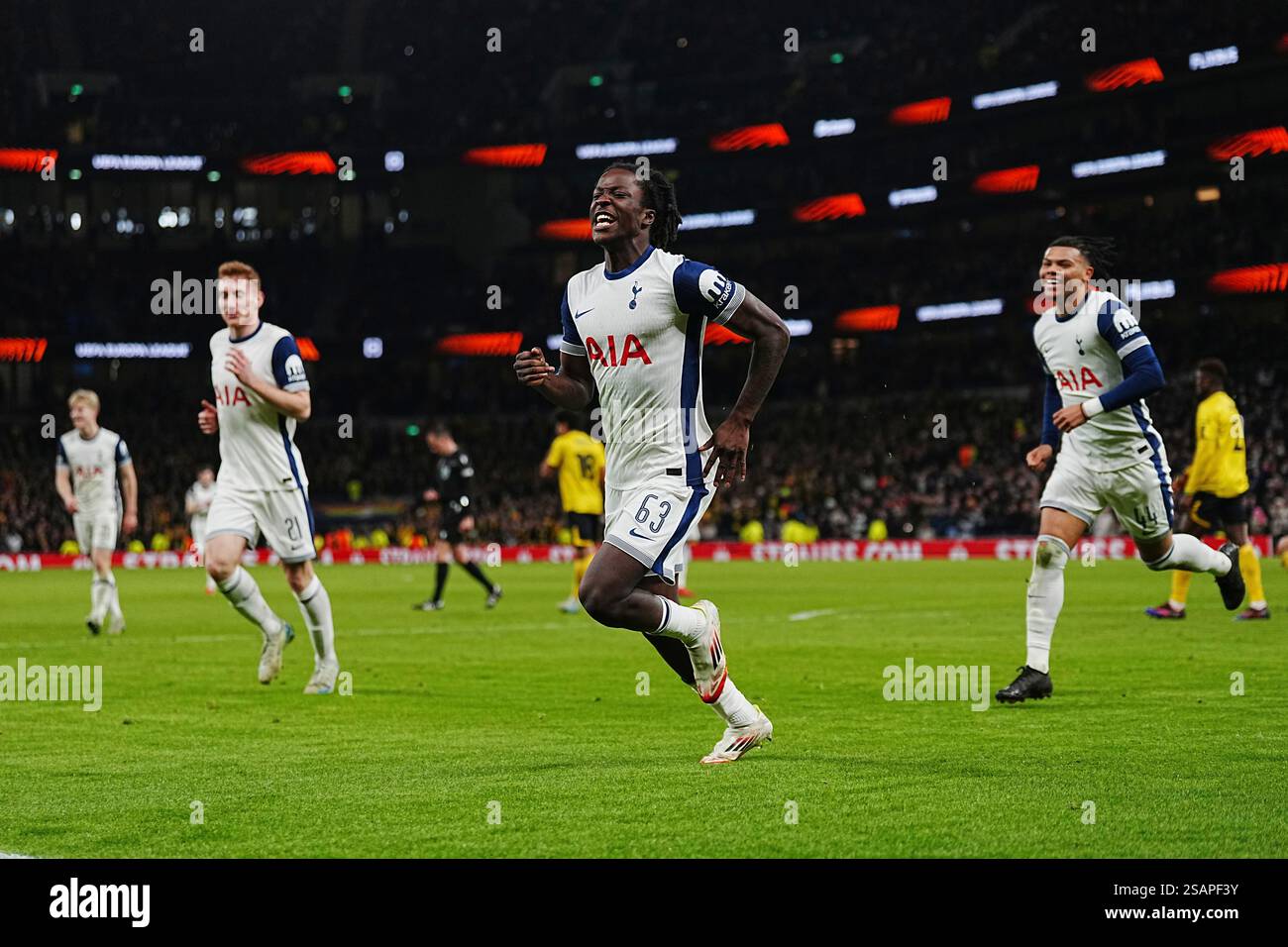 Tottenham's Oyindamola Ajayi, centre, celebrates after scoring his side ...