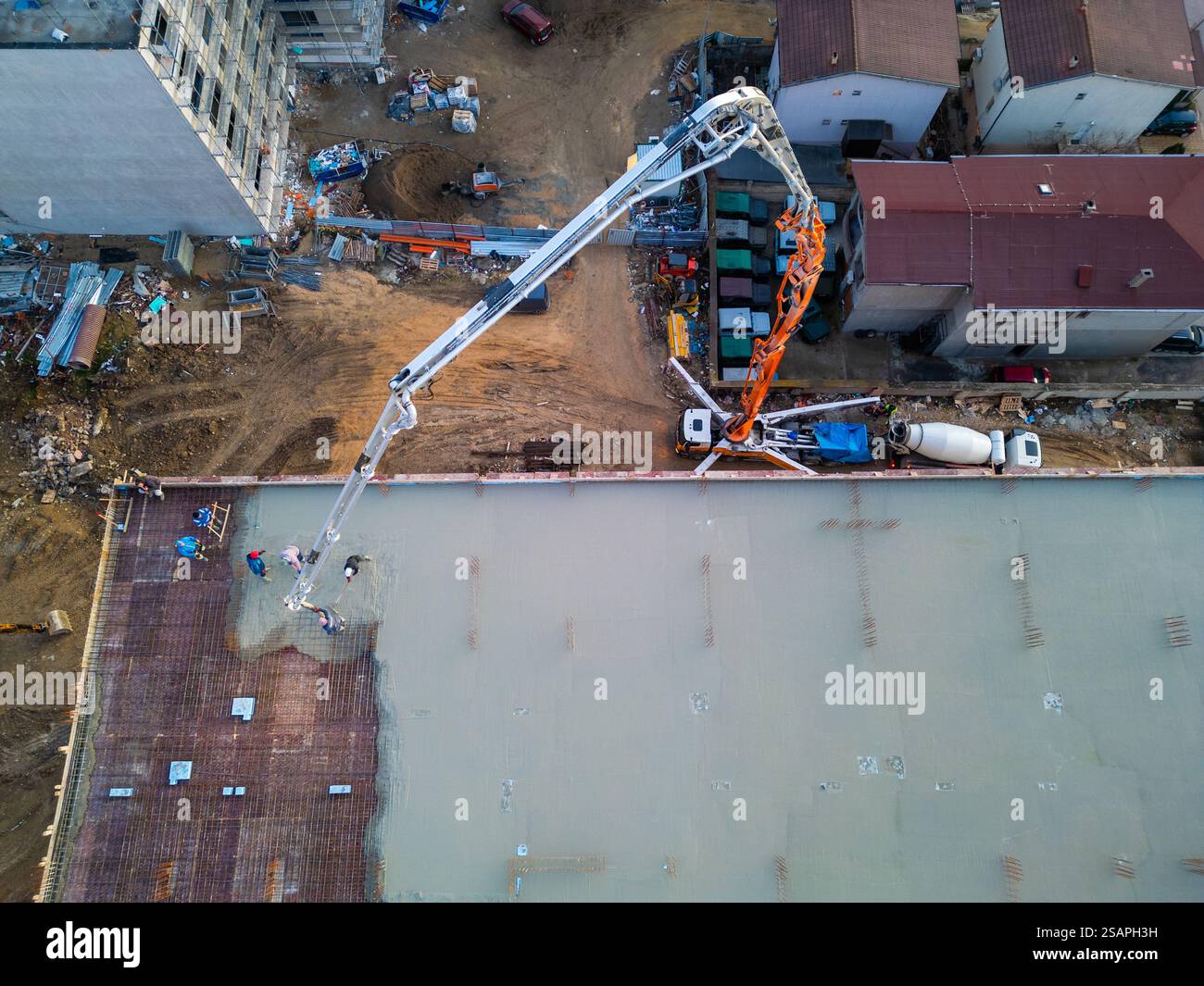 Aerial view of a construction site with a high-rise building under ...