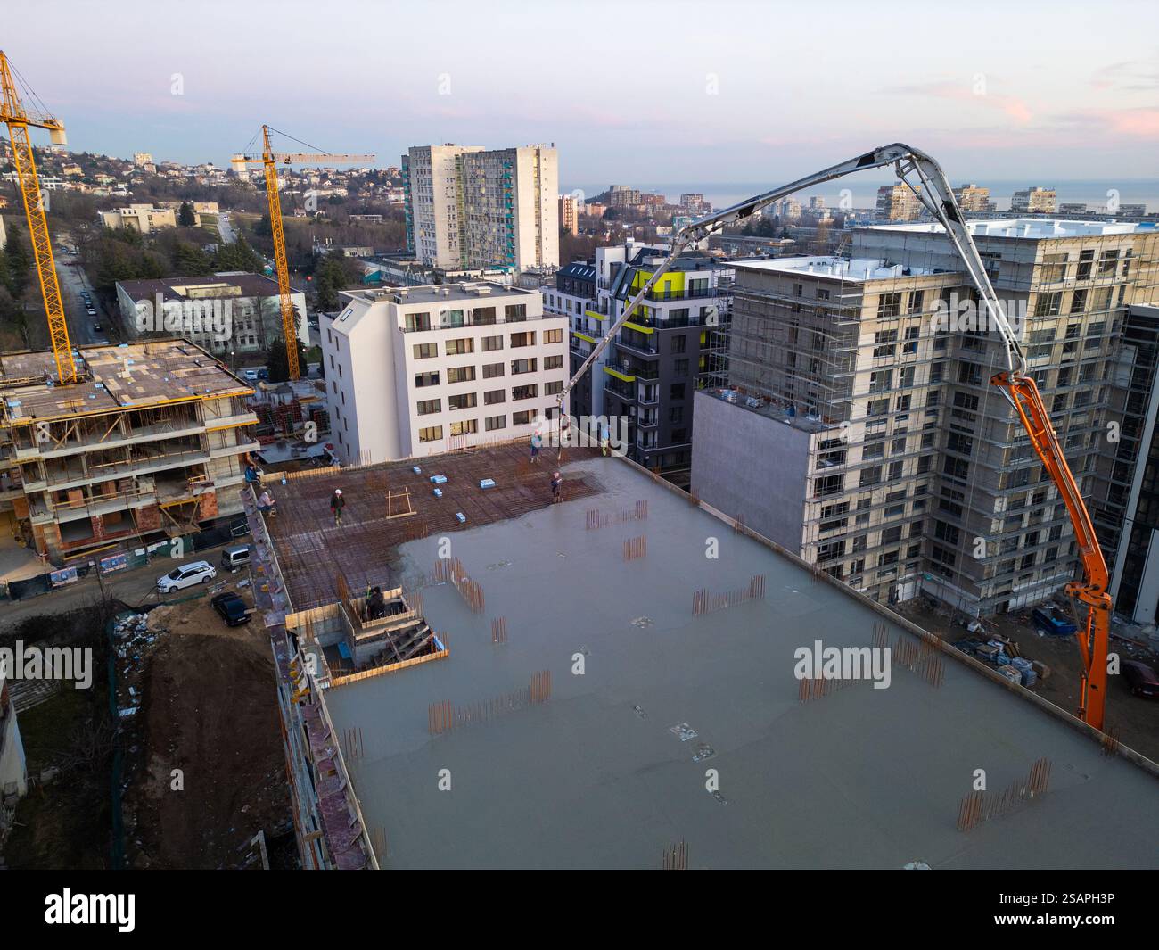 Aerial view of a construction site with a high-rise building under ...