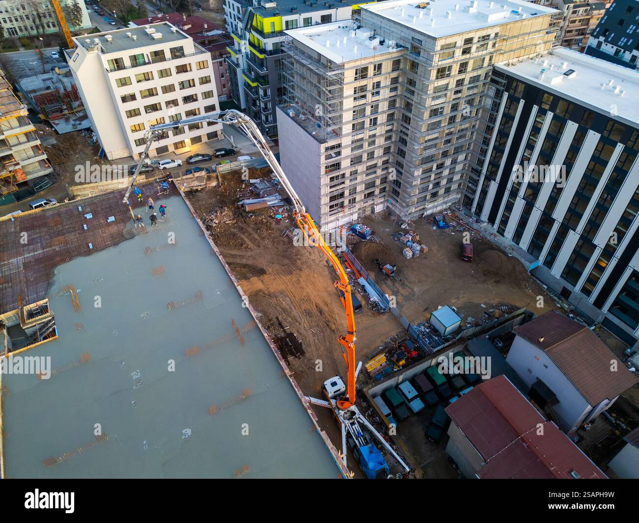 Aerial view of a construction site with a high-rise building under ...