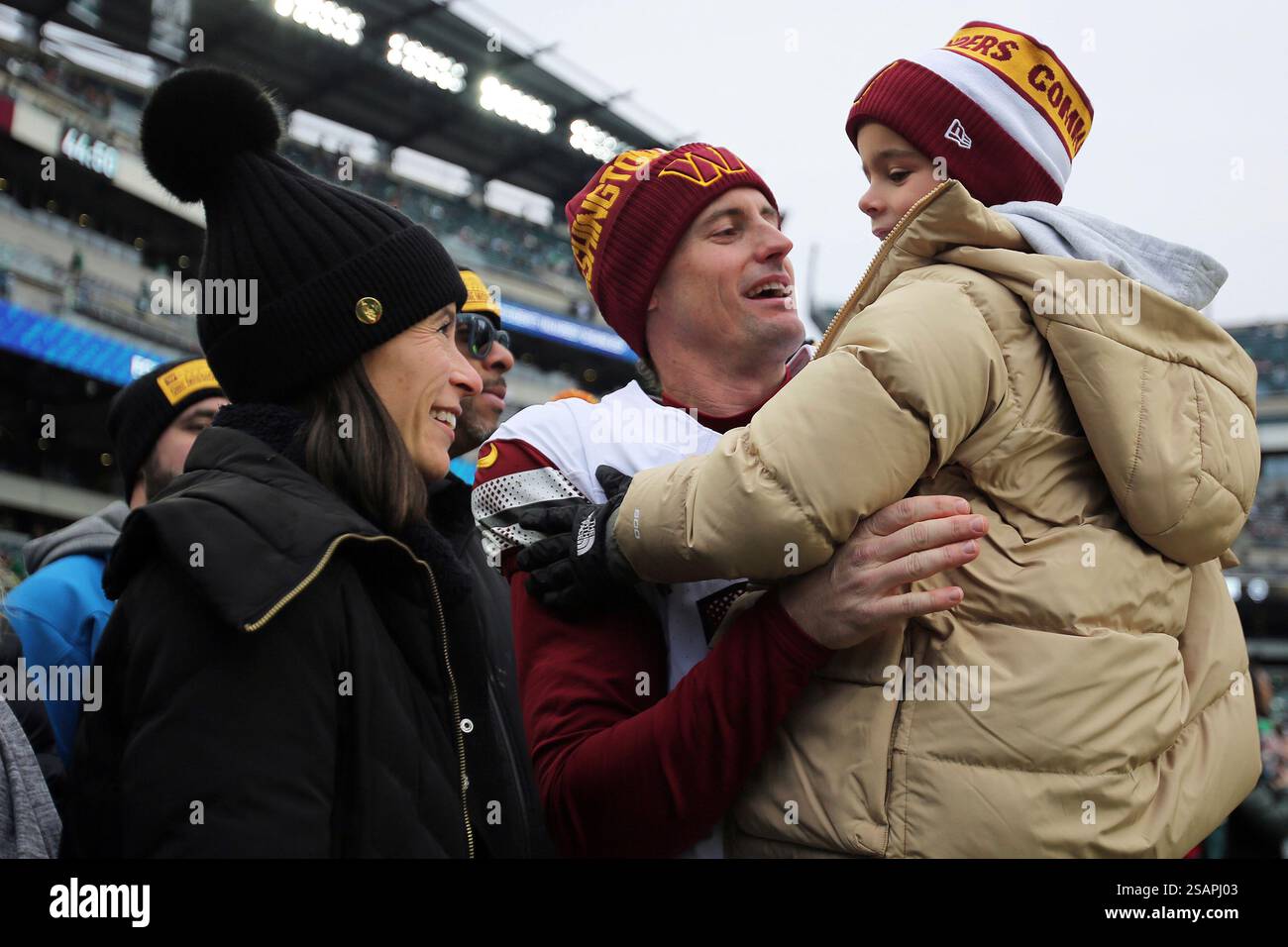 Washington Commanders punter Tress Way (10) interacts with his family ...
