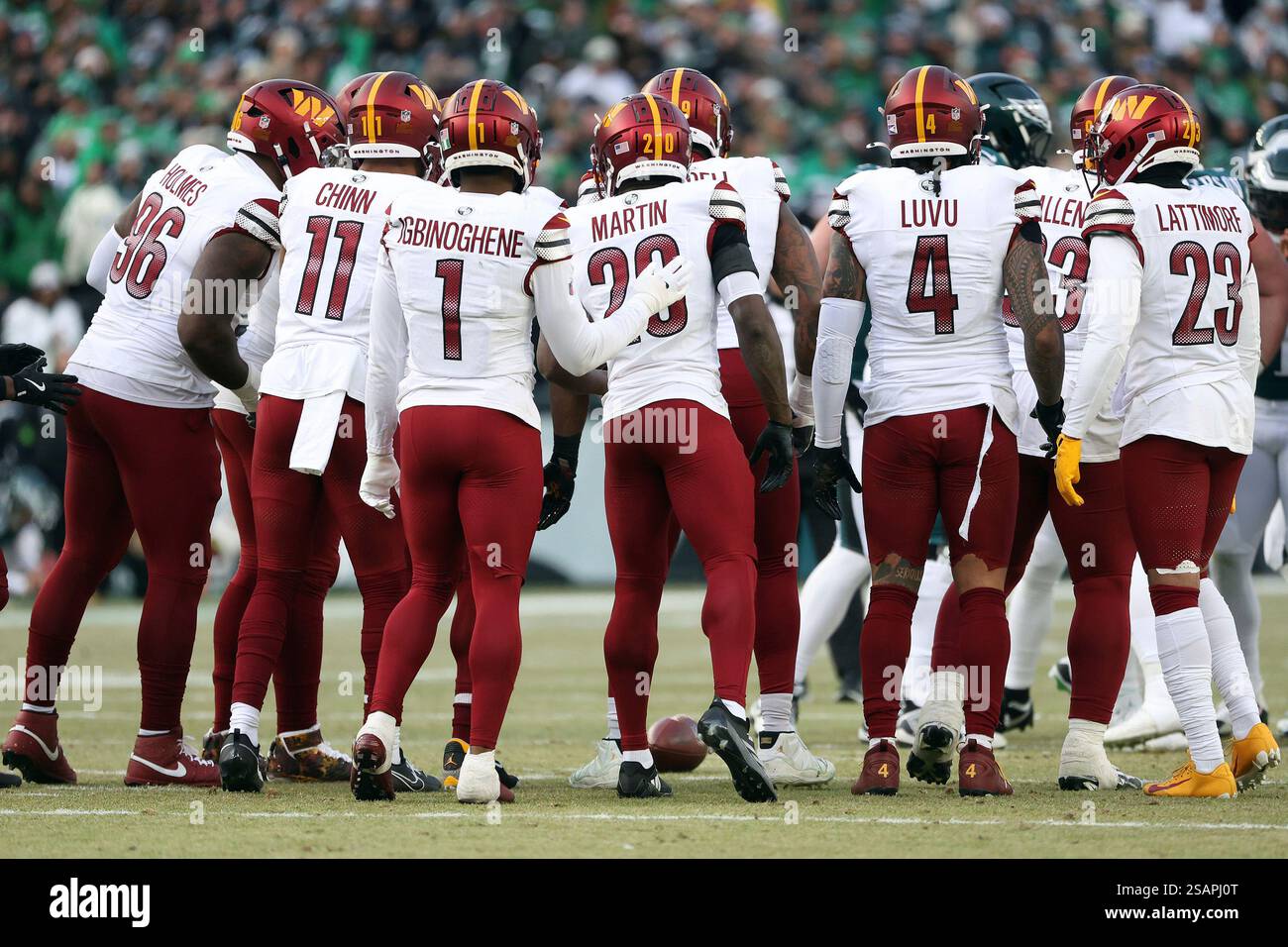 Washington Commanders players huddle up during the NFC Championship NFL ...