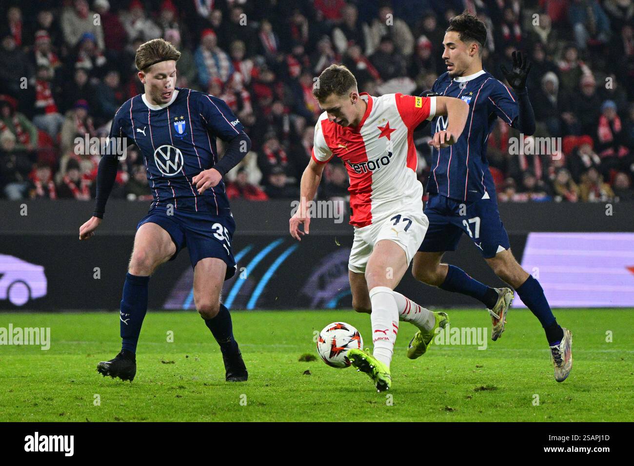 Prague, Cz. 30th Jan, 2025. L-R Nils Zatterstrom (Malmo), Daniel Fila ...