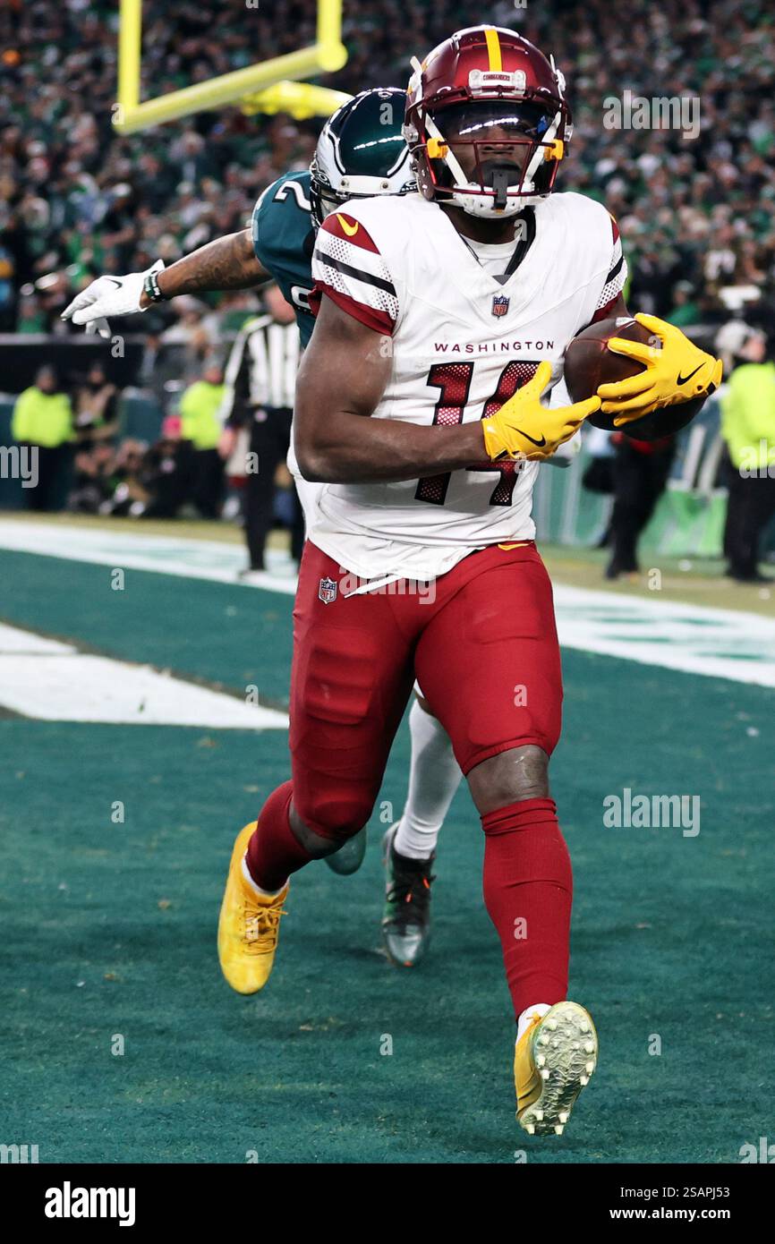 Washington Commanders wide receiver Olamide Zaccheaus (14) catches the ...