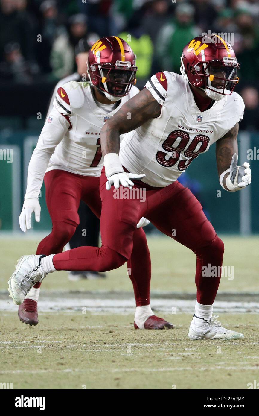 Washington Commanders defensive end Clelin Ferrell (99)rushes during ...