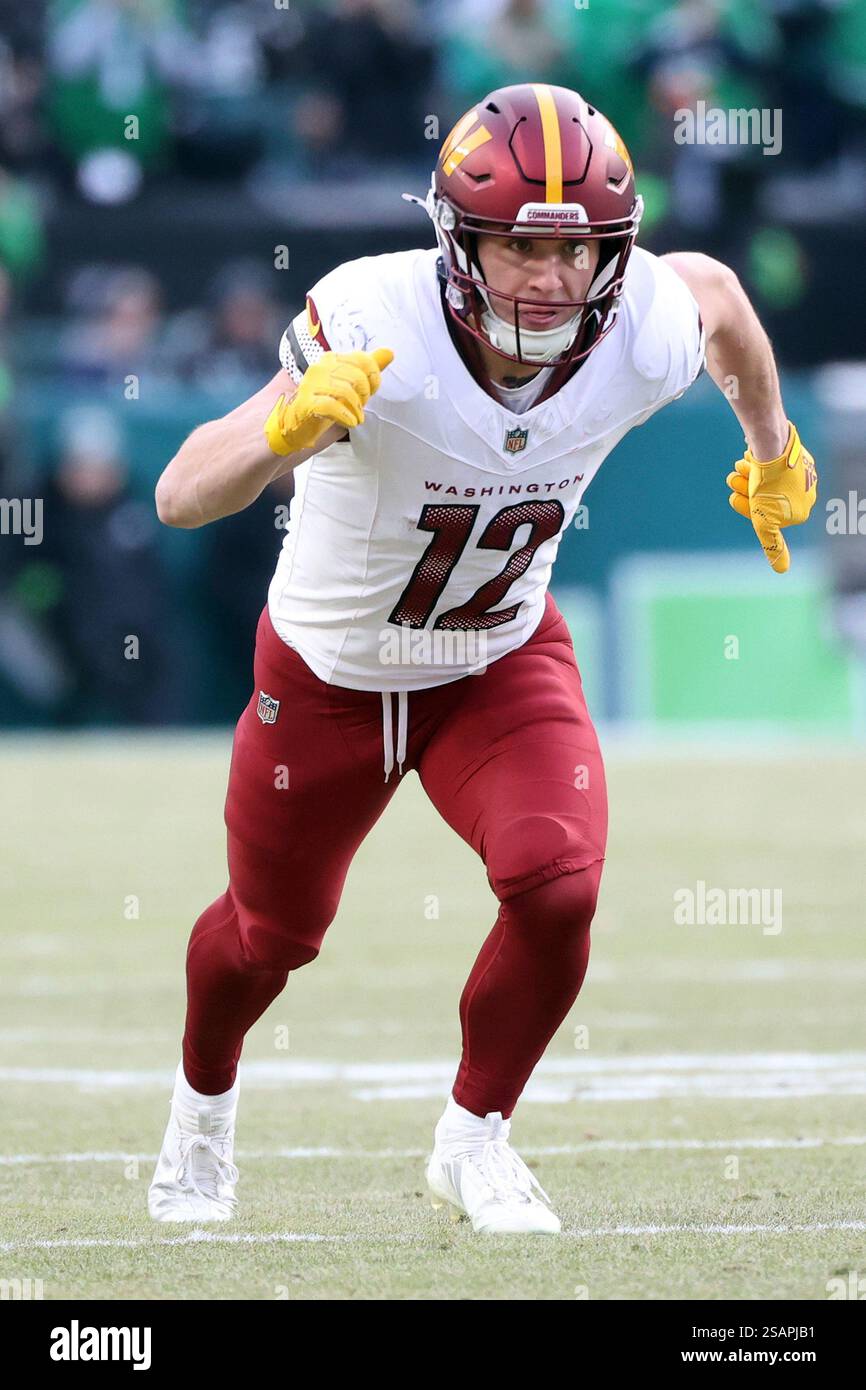 Washington Commanders wide receiver Luke McCaffrey (12) runs a route ...